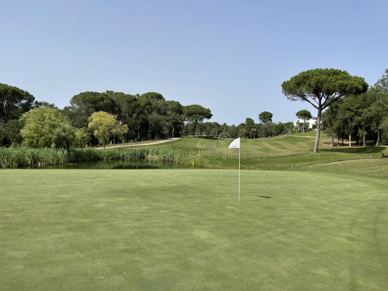 Beautiful Golf Course in Spain with a Pond, Green and Flag Stock Photo ...
