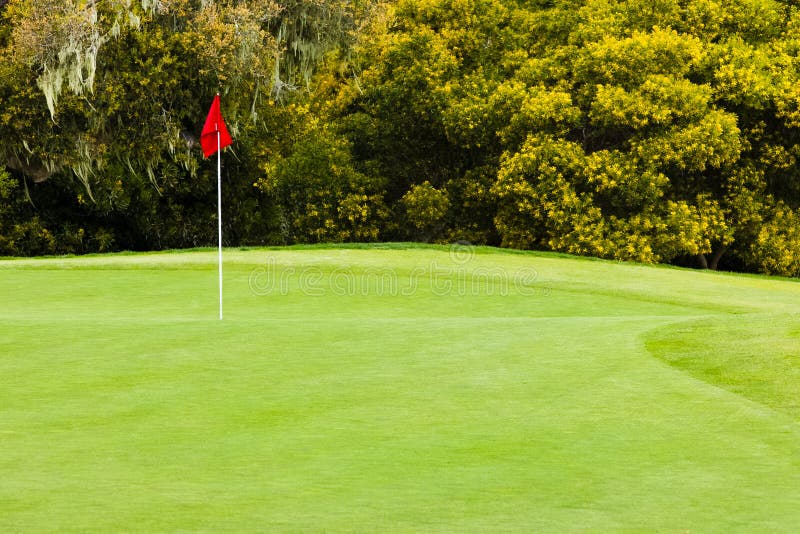 Beautiful Golf Green with Red Flag Stock Photo - Image of hills, green ...