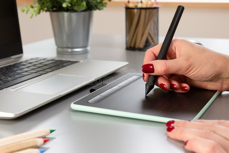 Beautiful Graphic Designer Drawing Digital Design on a Drawing Tablet ...