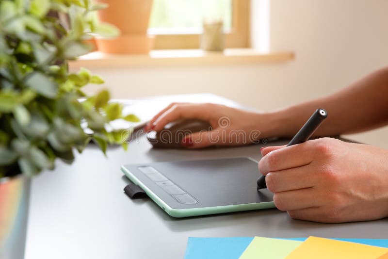 Beautiful Graphic Designer Drawing Digital Design on a Drawing Tablet ...