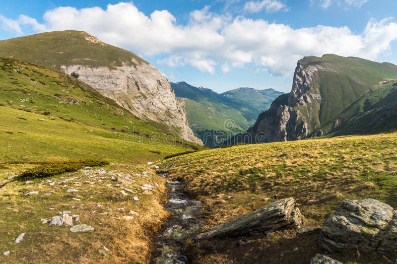 Beautiful grassy valley stock image. Image of hill, valleys - 52840799