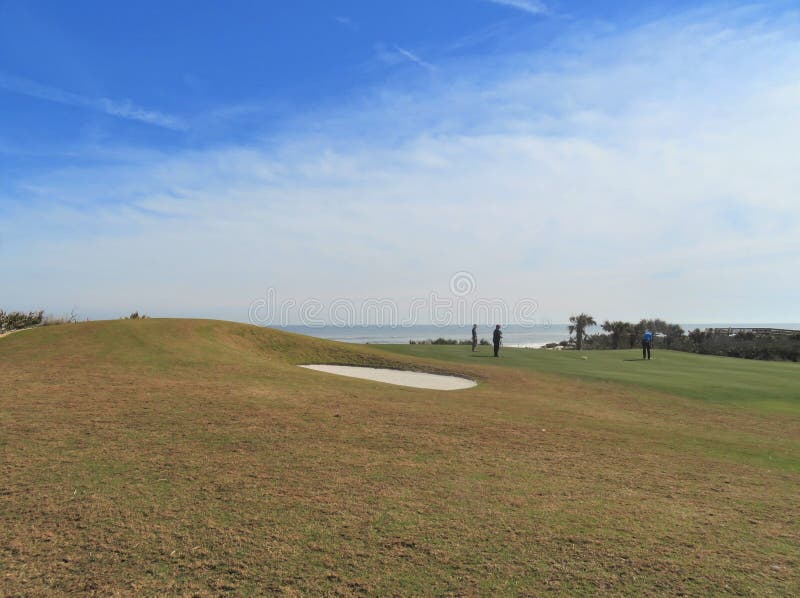 Golf Course With A Blue Sky Background Stock Image - Image of trees ...