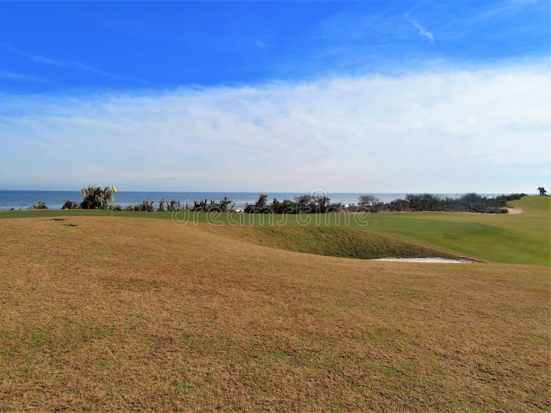 Golf Course with a Blue Sky Background Stock Photo - Image of green ...