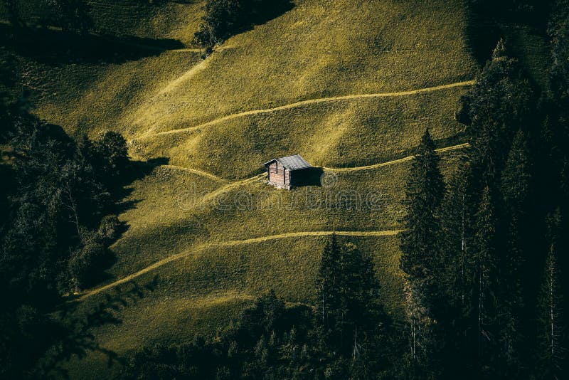 Beautiful Green Hillside with a Rural House Stock Image - Image of ...
