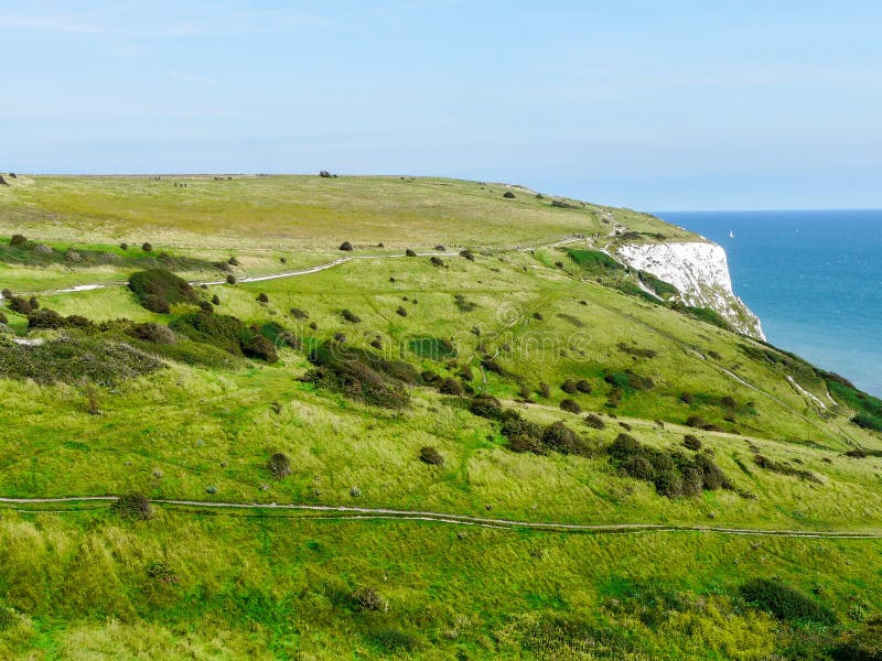A green meadow of Dover stock image. Image of mountain - 245526603