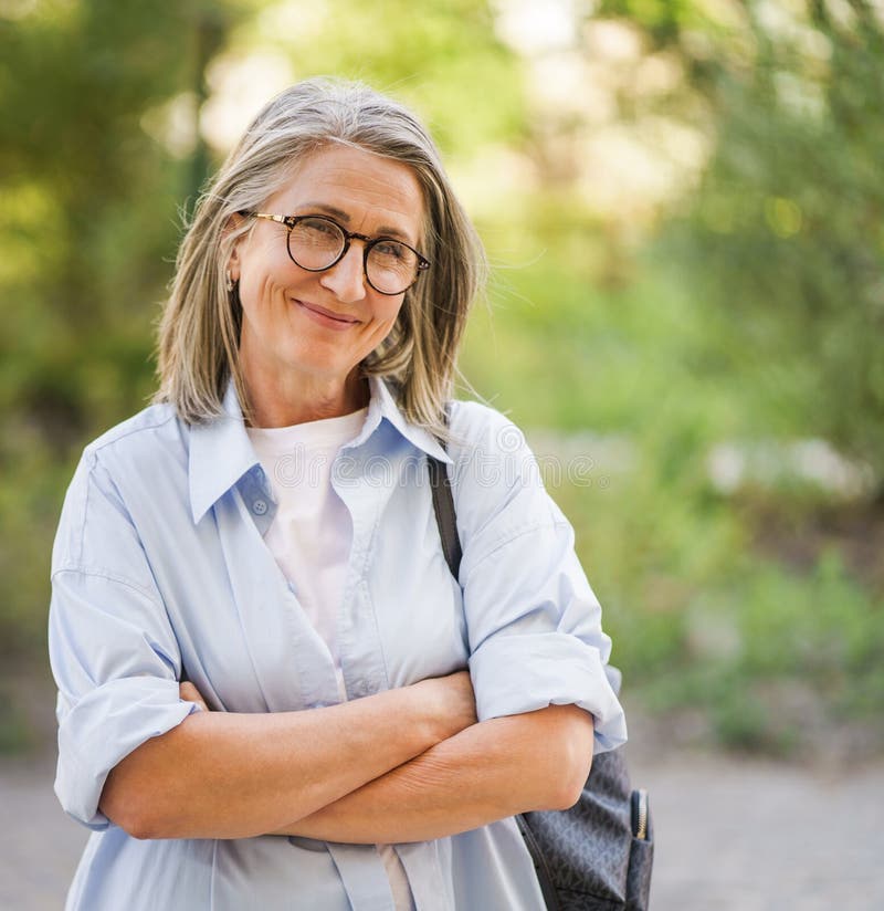 Mature Tender Grey Hair Woman In 50s European Ethnicity Posing Looking