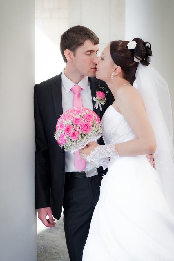 Beautiful groom and bride stock photo. Image of buildings - 26977754