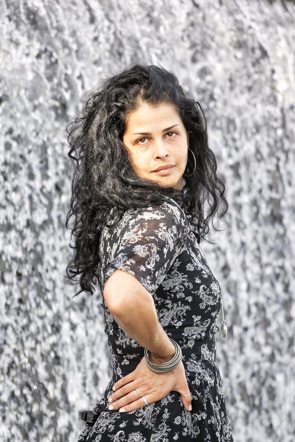 Beautiful Girl and a Waterfall Stock Photo - Image of face, adult: 65961954
