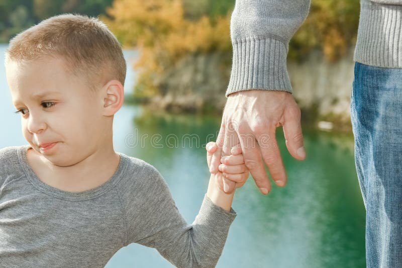 A Beautiful Hands of Parent and Child by the Sea Stock Image - Image of ...