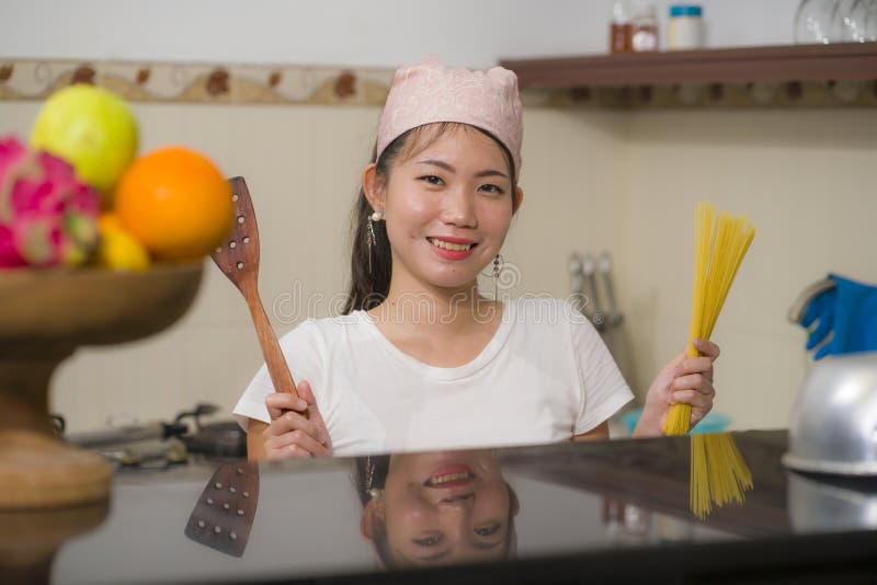 Beautiful And Happy Asian Woman Preparing Noodles Young Sweet And