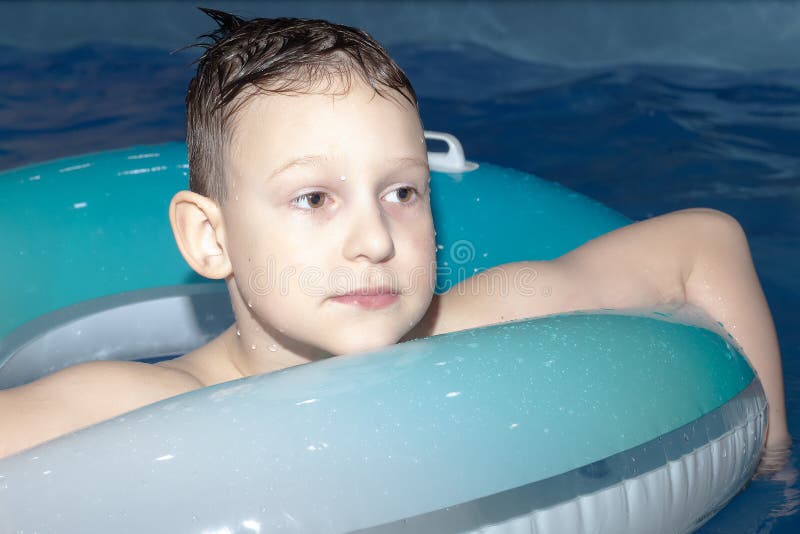 A Beautiful Happy Boy To Swim in the Pool Stock Photo - Image of ...