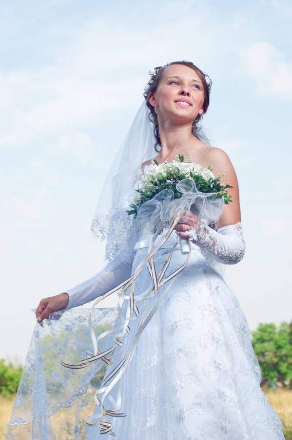Beautiful Happy Bride Looks Down Stock Photo - Image of adult ...
