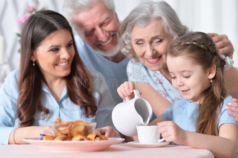 Beautiful Happy Family Drinking Tea Stock Image - Image of giirl ...