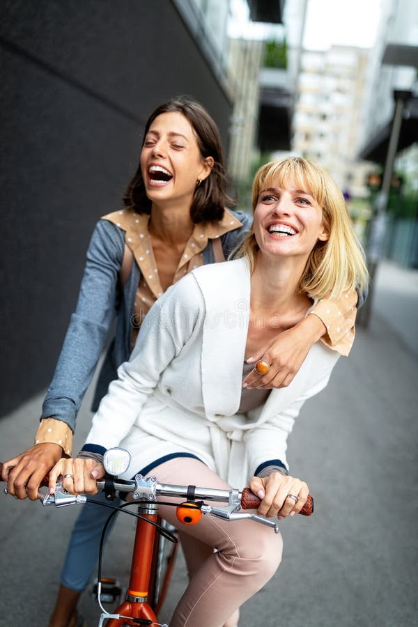 Cheerful Lesbians Embrace Passioantely And Have Fun Together Stock