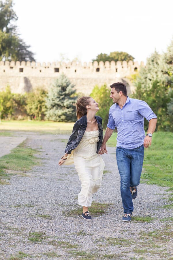 Beautiful Happy Smiling Running Couple Stock Photo - Image of autumn ...