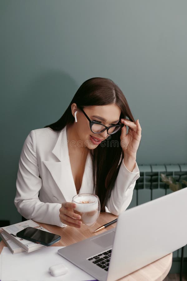 Beautiful Happy Woman Working with Laptop. Smiling Business Woman Using ...
