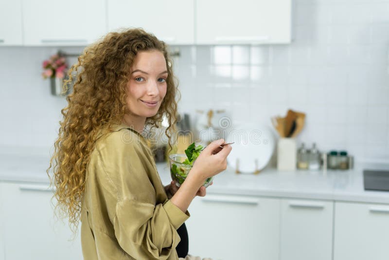 Beautiful Healthy Woman Smile Happy Eat Vegetable Look At Camera In