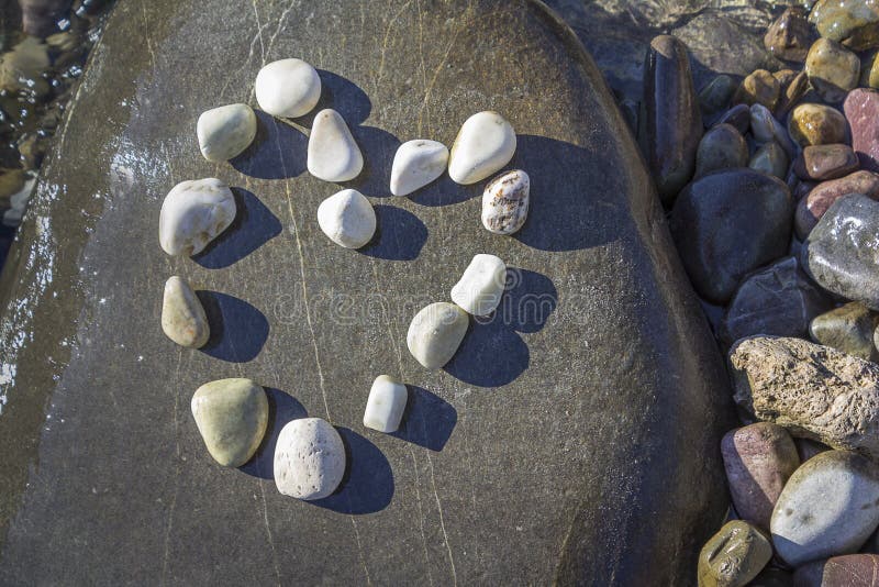 Beautiful Heart Made of Stones Over the Rock Stock Photo - Image of ...