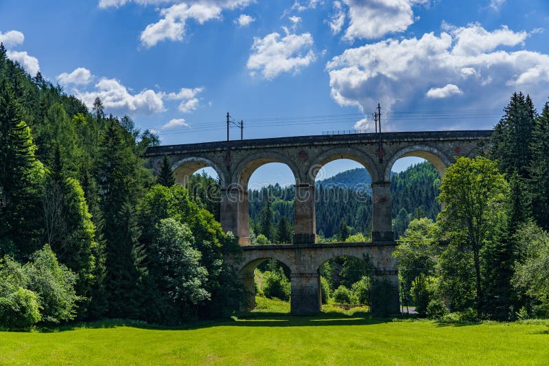 A Beautiful High Railway Viaduct Running Over a Wooded Valley Stock ...