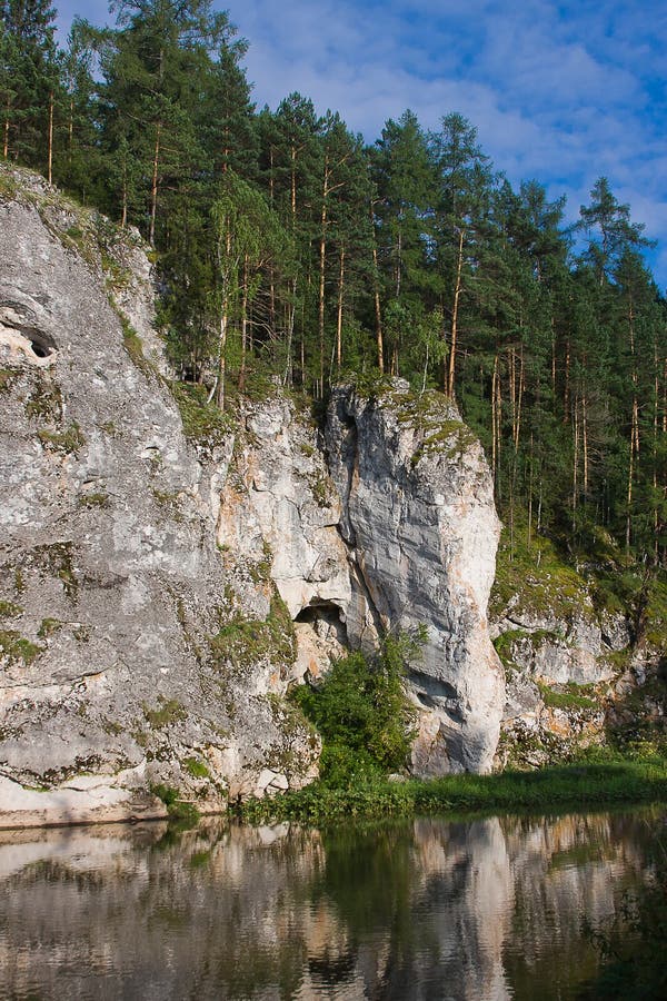 Beautiful high rock stock image. Image of nature, reflection - 63960599