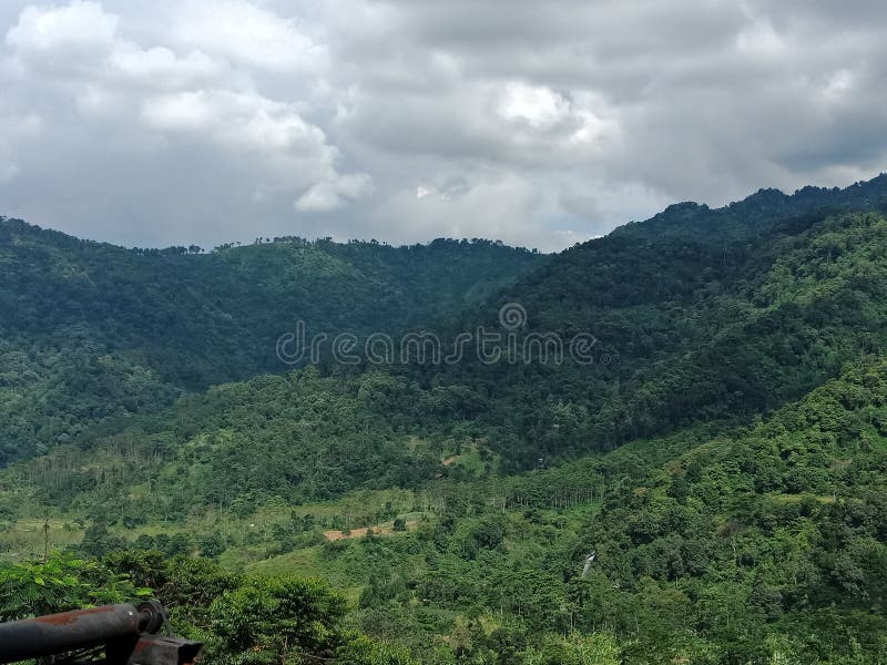A Beautiful Hillside View with Cloudy Sky in the Peak Area, Bogor ...