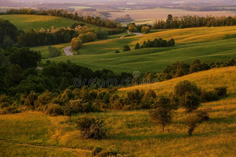 Beautiful Hilly Landscape with Lake and Blue Cloudy Sky Stock Photo ...