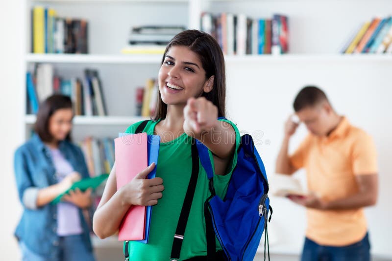 Beautiful Hispanic Female Student with Group of Young Adults Stock ...