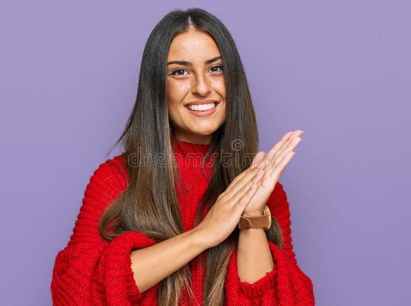 Beautiful Hispanic Woman Wearing Casual Clothes Clapping And Applauding