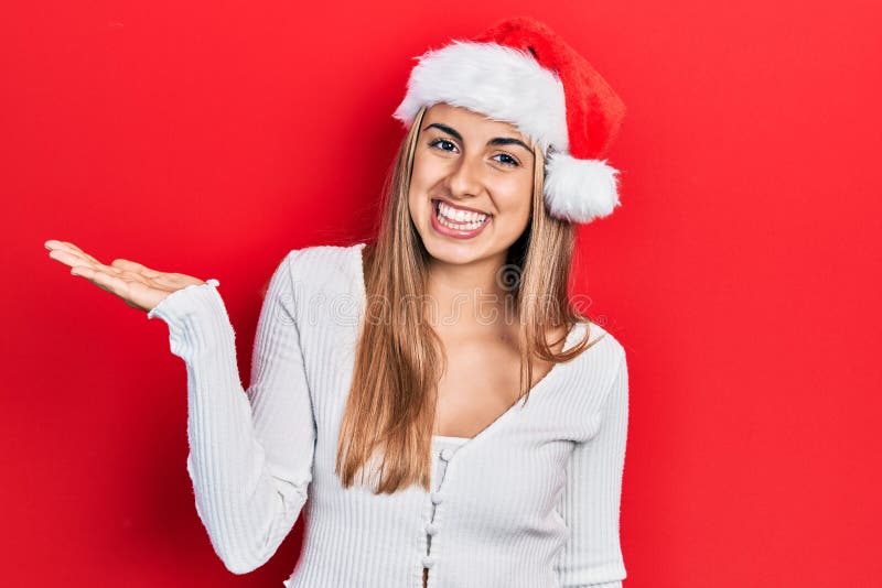 Beautiful Hispanic Woman Wearing Christmas Hat Smiling Cheerful