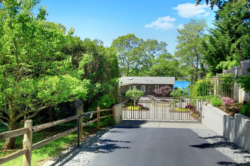 Beautiful Home with Private Gates, Driveway and Garden. Stock Image ...
