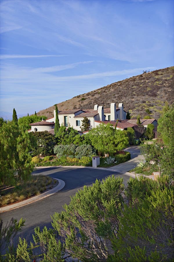 Beautiful House on a Hill by a Road Stock Photo - Image of hilly ...