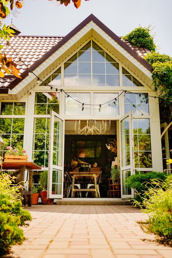 Beautiful House with Large Panoramic Windows Surrounded by Greenery ...