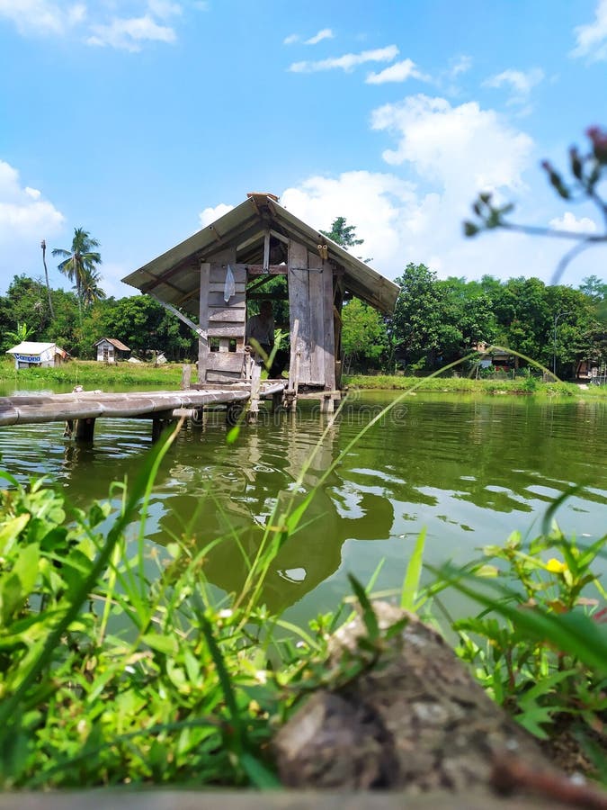 Beautiful Hut on the water stock photo. Image of garden - 287711680