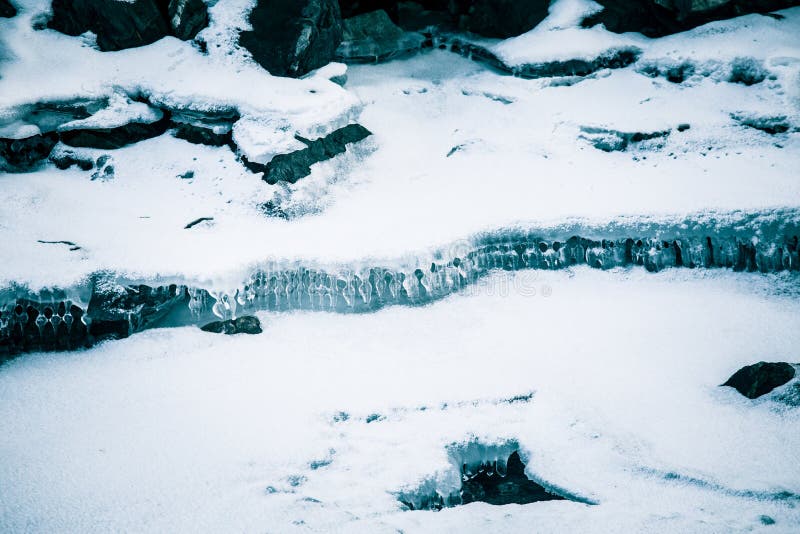 A Beautiful Ice Formations Along the Frozen River in Winter Stock Photo ...