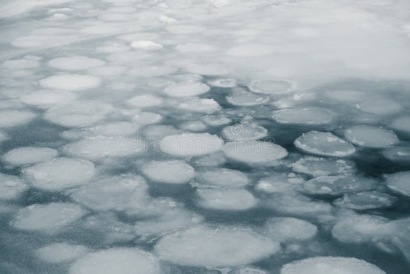 A Beautiful Ice Formations Along the Frozen River in Winter Stock Photo ...