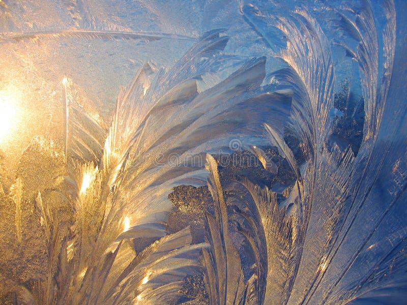 Ice Pattern and Sunlight Close Up on Window Glass Early in the Morning ...