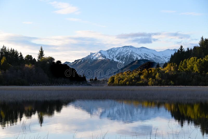Beautiful Image of the Forest and Mountains Reflecting in the Water ...