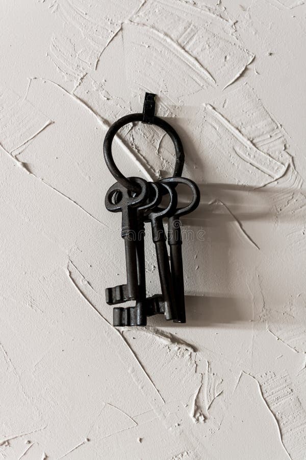 Old keys in the wall stock photo. Image of hanging, keys - 149628140