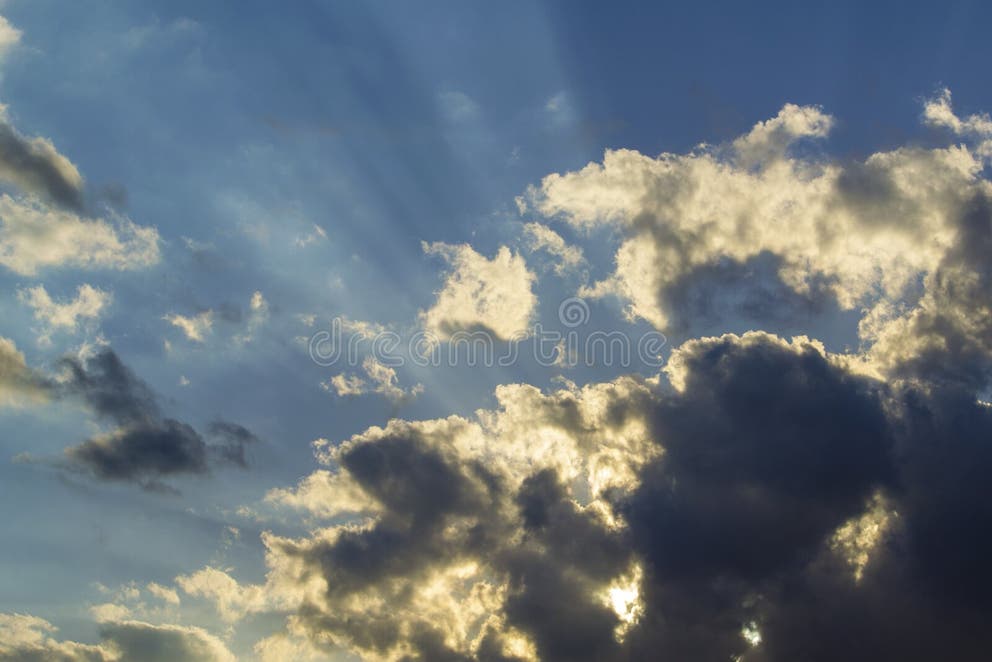 Sun Rays Going through Clouds Stock Photo - Image of flash, cloud ...