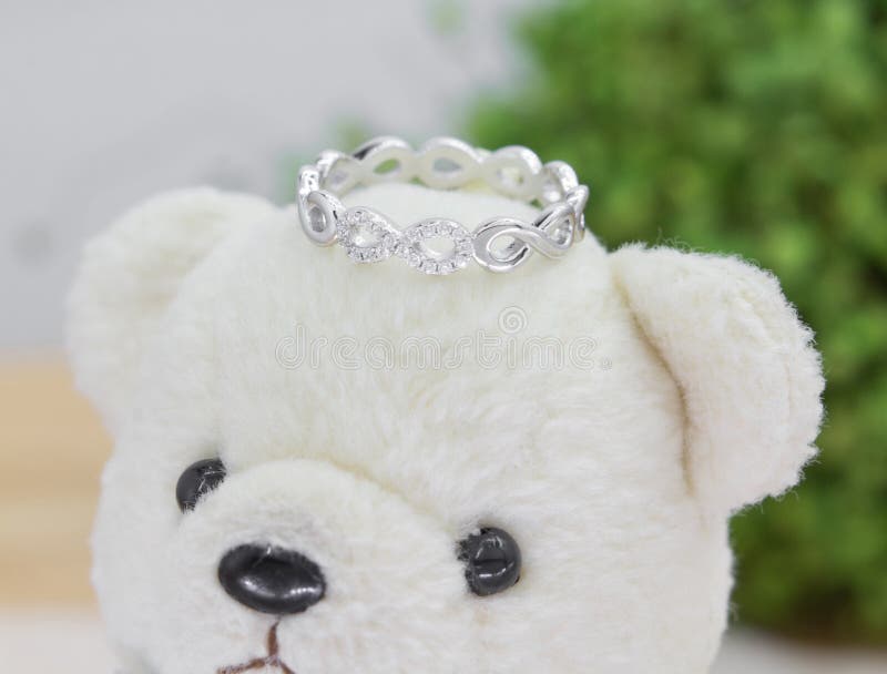 Beautiful Infinity Shape Silver Ring Decorated with Diamonds Stock ...
