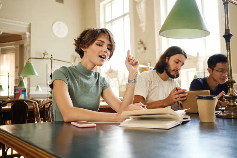 Beautiful Inspiring Student with Book Working on New Study Project in ...