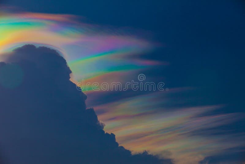 Beautiful Iridescent Cloud, Irisation or Rainbow Cloud Stock Photo ...
