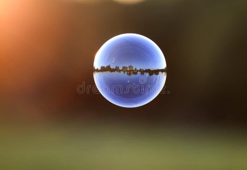 Beautiful Iridescent Soap Bubble with Reflection Landscape Flies Stock ...