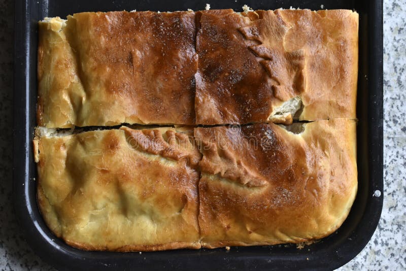 A Beautiful and Juicy Meat Pie on a Baking Sheet. Delicious Potato Pie ...