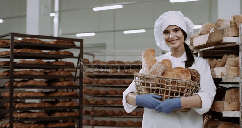 Closeup Perfect Look of Young Woman Baker in a Bakery she Smelling ...