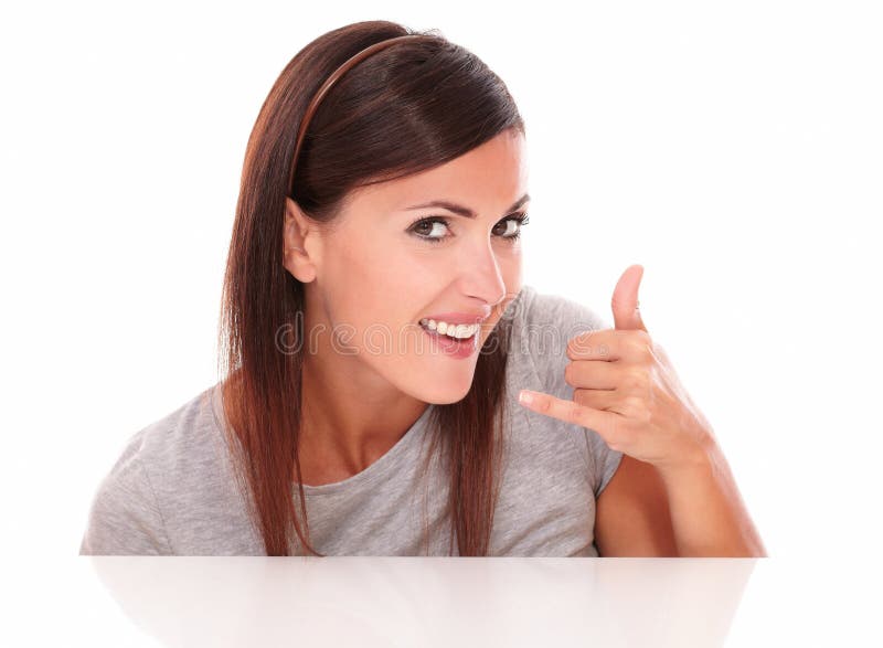 Beautiful Lady with Call Gesture Smiling at Camera Stock Image - Image ...