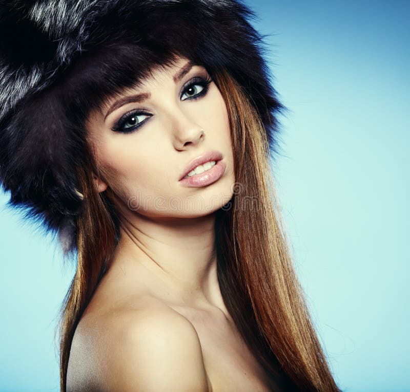 Beautiful lady in fur cap stock image. Image of cute - 28129033