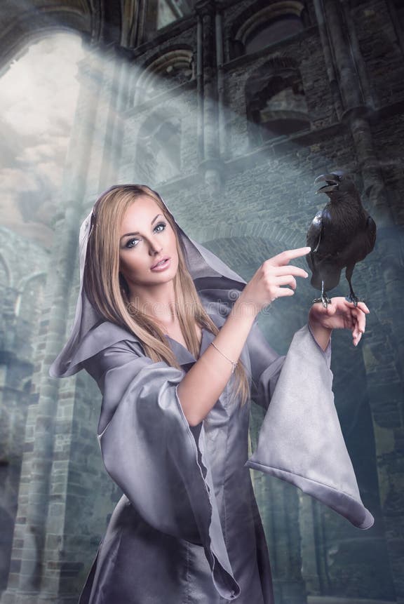 Beautiful lady with raven stock image. Image of nature - 27989071