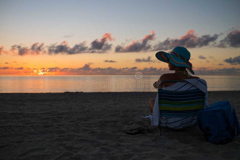 Beautiful Lady Resting Alone on a Beach on a Sunset Stock Photo - Image ...