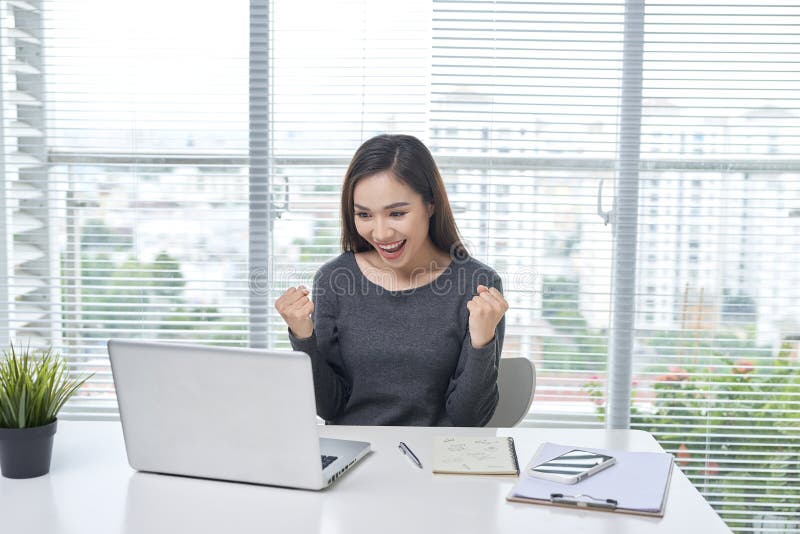 A Beautiful Lady Sitting at a Table. Office Life Stock Photo - Image of ...
